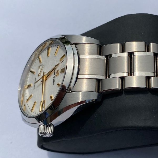 Fs: Grand Seiko Golden Snowflake SBGA259 2022; $5,775 | WatchCharts