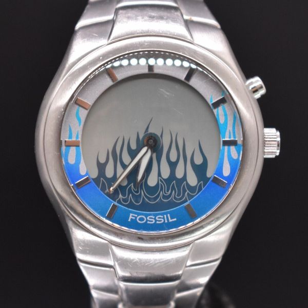 Vtg FOSSIL BIG TIC JR-8222 Watch Men Y2K Animated Flame Blue Dial NEW BATTERIES | WatchCharts ...