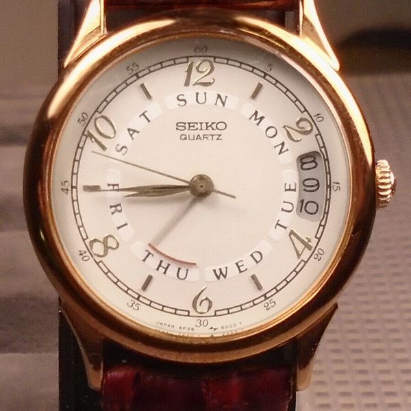 Seiko men's quartz watch having a rather unique calendar design layout ...