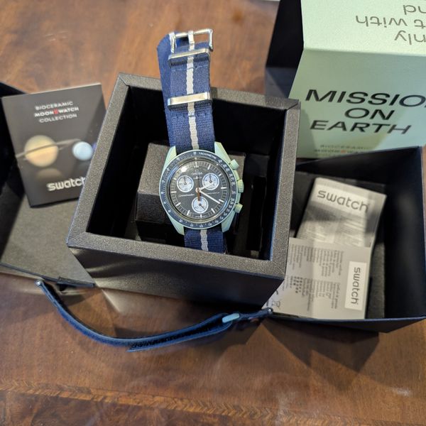 Moonswatch Earth - with box, extra strap, and orig receipt ...