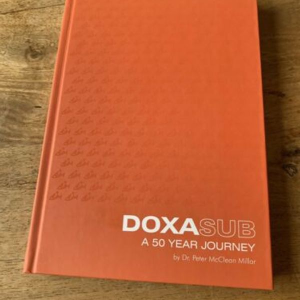 Doxa SUB Watch 50th Anniversary Collectors Book | WatchCharts Marketplace