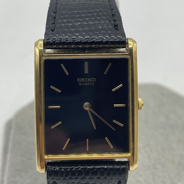 AUTHENTIC Vintage SEIKO QUARTZ 7N00-5B20 Black Seiko Tank 25mm Menâ s Watch | WatchCharts ...