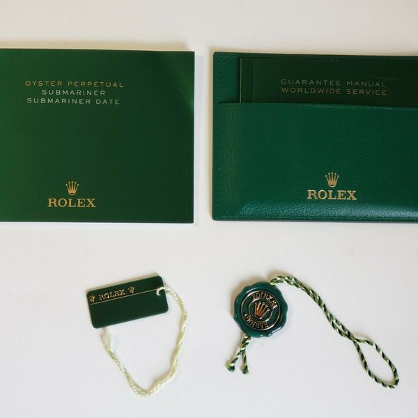 ROLEX SUBMARINER 114060 BOOKLET / HANG TAG SET | WatchCharts Marketplace