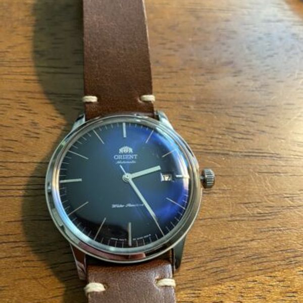 orient bambino Blue Dial | WatchCharts