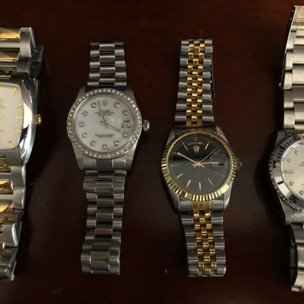 3 Rolex watches and 1 ducks unlimited watch | WatchCharts Marketplace