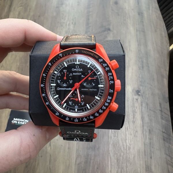 Omega Moonswatch - Mission On Earth Lava | WatchCharts Marketplace