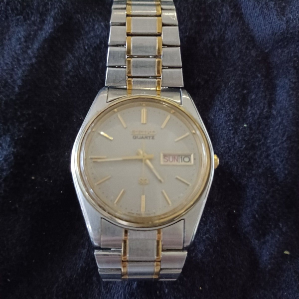 VINTAGE MENS SEIKO QUARTZ SQ 8223-7189 - SILVER/GOLD WITH CASE | WatchCharts Marketplace