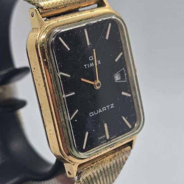 Vintage Timex F Cell Gold Tone Quartz Wristwatch | WatchCharts Marketplace