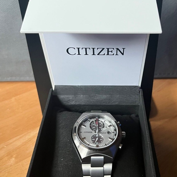 Citizen Eco-Drive Titanium Model CA7090-52A White Dial Solar Quartz ...