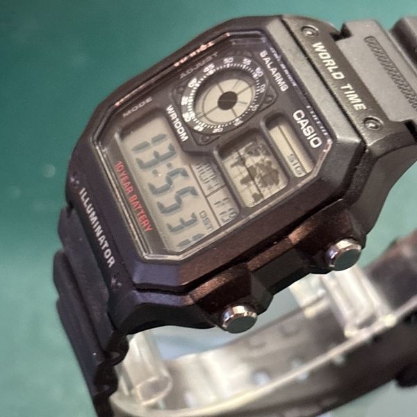 Casio AE-1200WH World Time Digital Watch 3299 Illuminator 100M – Black ...