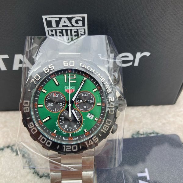 Tag Heuer black bezel green dial men's watch | WatchCharts Marketplace