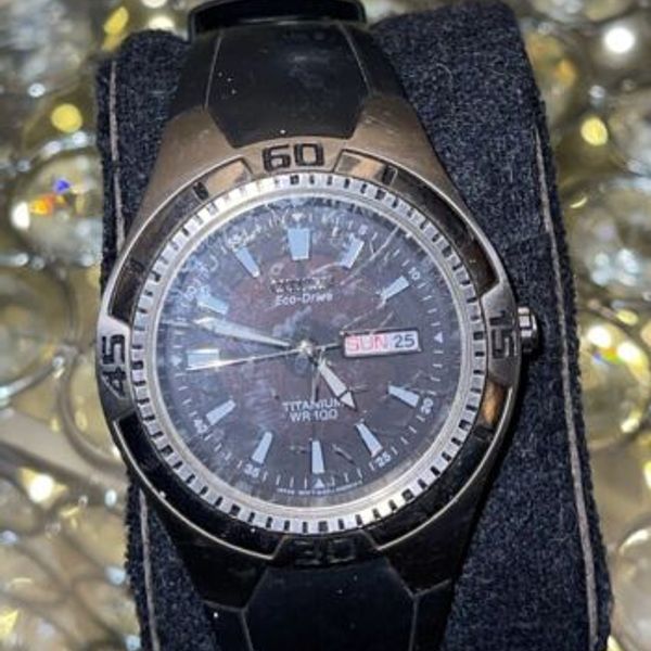 Citizen Eco-Drive Titanium WR100 Black Face. E101-K004438 | WatchCharts ...