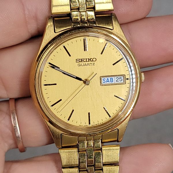 Vintage Mens Seiko 7N43-8A39 Gold Tone Day Date Round Quartz Watch | WatchCharts Marketplace