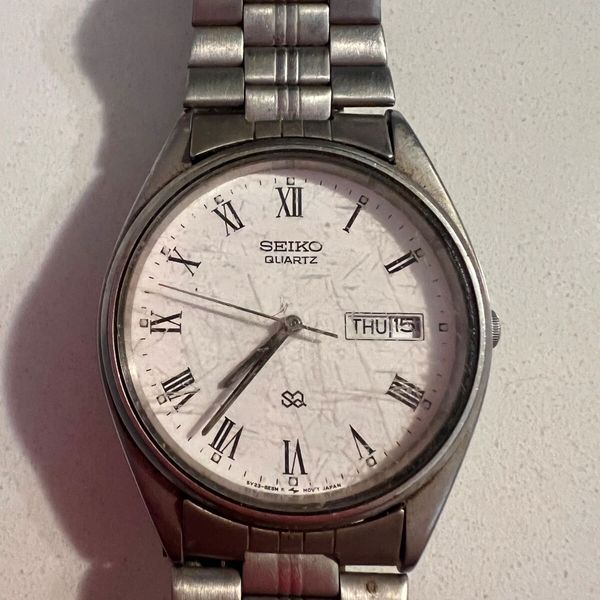 Seiko Quartz day/date and time wrist watch Japan | WatchCharts Marketplace