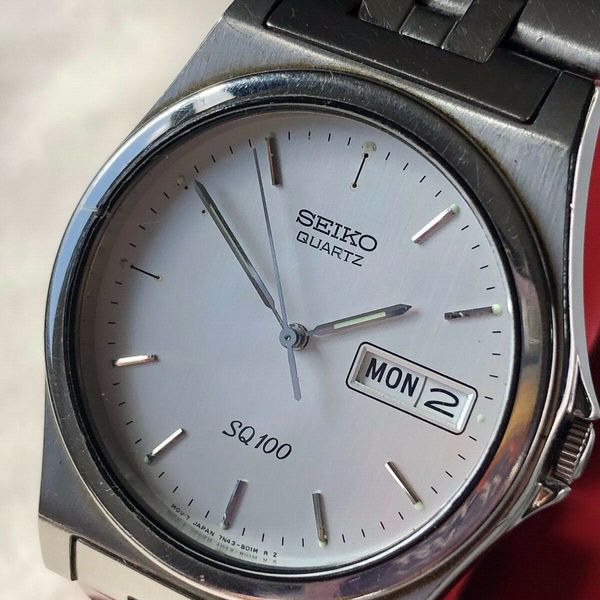 Seiko SQ100 Quartz Day/Date | WatchCharts Marketplace