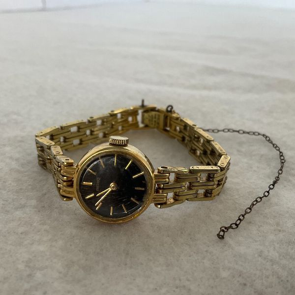 SEIKO 10K Gold Plated Round Black Women Watch As-Is | WatchCharts ...