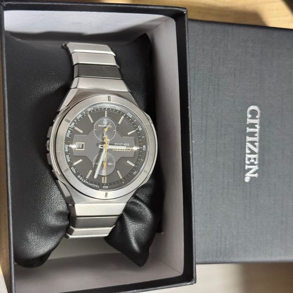 Citizen Eco-Drive Titanium Chronograph Watch CA7058-55E | WatchCharts ...