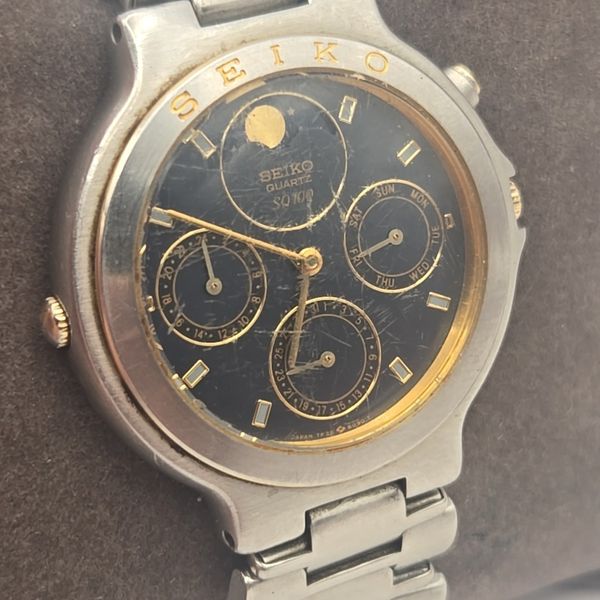 Seiko SQ 100 Moon Phase 35mm Black Dial Steel Daydate Men's Wristwatch ...