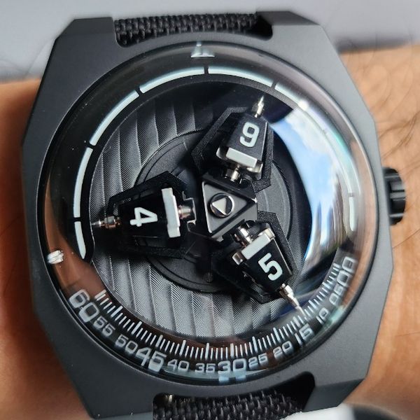 Angles Cerberus Obsidian - rotating hour | WatchCharts Marketplace