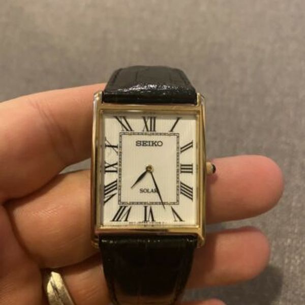 Seiko Solar Mens Tank Style Black Leather Gold Tone Dress Watch SUP880 | WatchCharts Marketplace