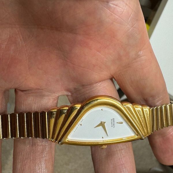 Vintage Seiko Half Moon Yellow gold tone Watch 1N00-5E09 RO | WatchCharts Marketplace