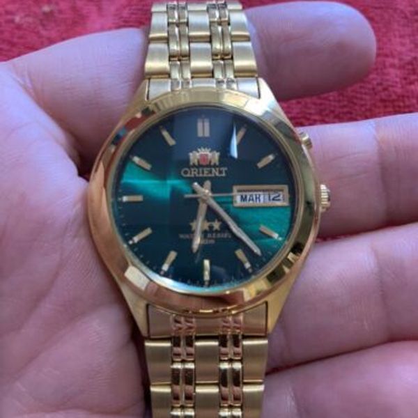 ORIENT Tri Star- Green Dial, Gold Band, Octagonal Crystal | WatchCharts ...