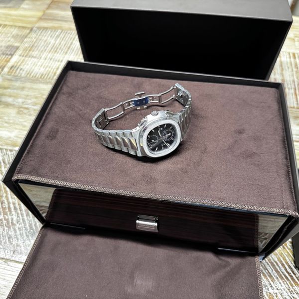 Patek Philippe Nautilus 5990 Blue Dial Sept 2023 | WatchCharts Marketplace