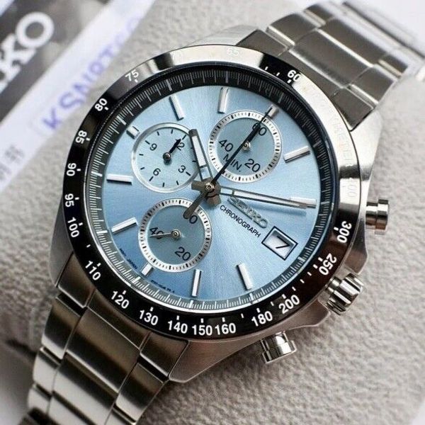 Menâ s stainless steel light blue dial seiko. New with box and tags ...