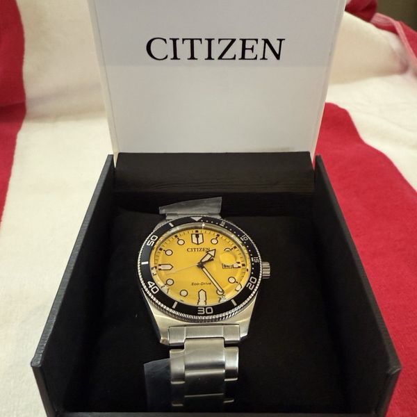 Citizen Eco Drive Mens Watch Yellow Dial Black Bezel AW1760-81Z Date ...