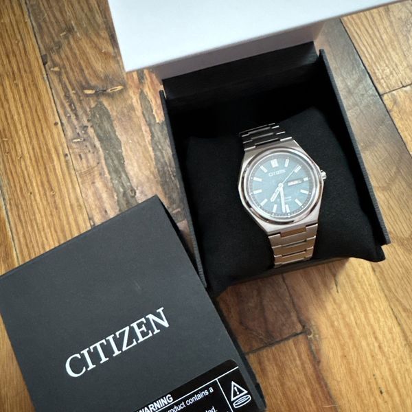Citizen AW0130-85X Eco-Drive Super Titanium Sapphire Green Dial Men's ...