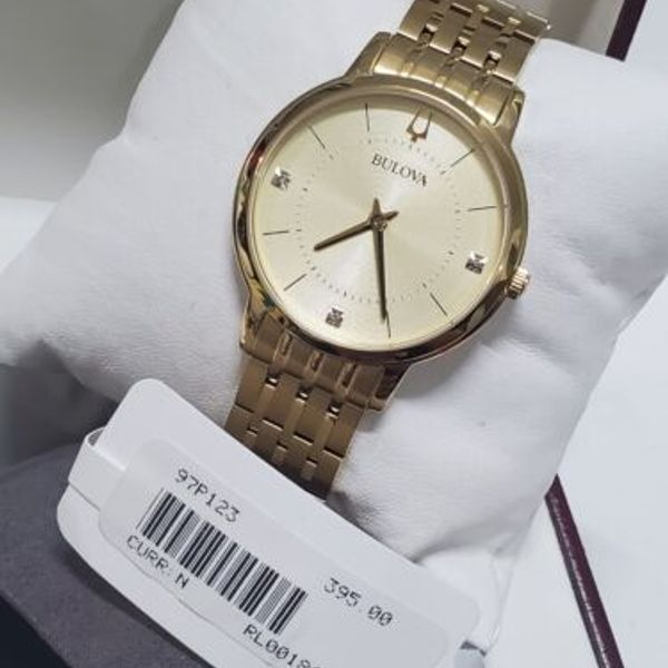 Bulova Women's Quartz Ultra Slim Gold Tone Champagne Dial Watch 36MM ...