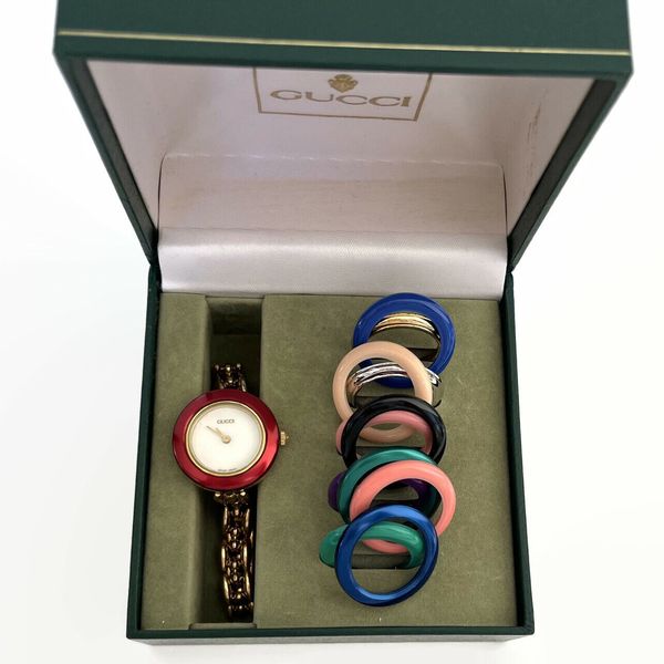 GUCCI WATCH WITH 12 INTERCHANGEABLE BEZELS IN DIFFERENT COLOURS ...