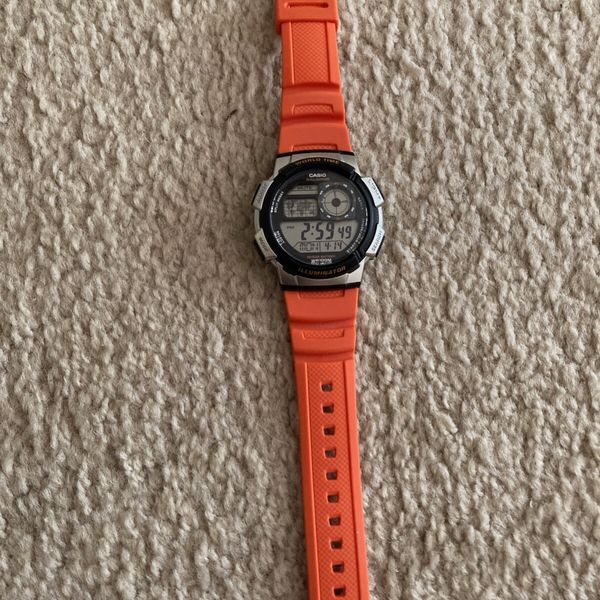 Casio AE1000W Watch, World Time, 5 Alarms, 10 Year Battery, Orange ...