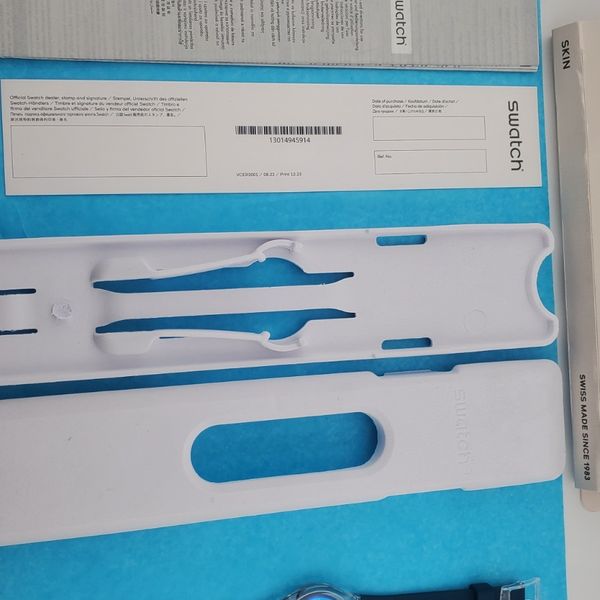 Swatch Blue Away, SO28K700 has a dark teal strap hypnotic Solar ...