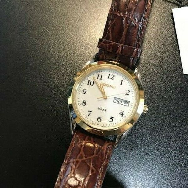 Seiko Men's SNE056 Stainless Steel Solar Watch with Leather Band | WatchCharts