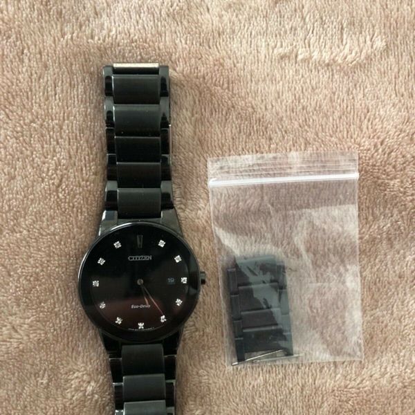 Citizen Paradigm Eco-Drive AW1555-56G 40 mm Black Case Black Bracelet Watch | WatchCharts