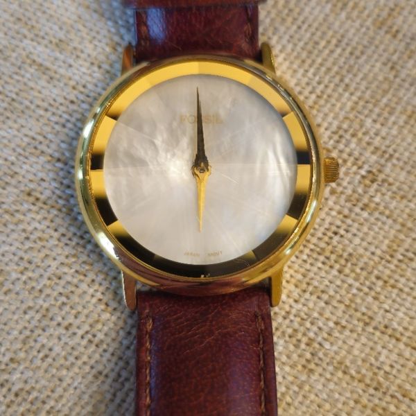 Fossil watch womens gold color pearl look watch face beveled glass ...