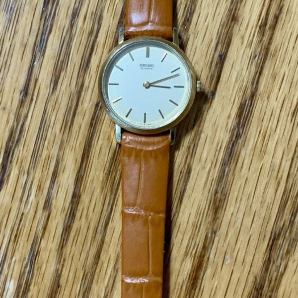 vintage ladies seiko quartz gold tone watch 2320-0880 Extra Gold Toned Stretch | WatchCharts ...