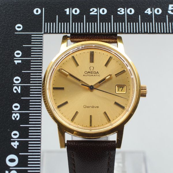 Vintage OMEGA Geneve Gold Dial Date Automatic Men's Watch | WatchCharts ...