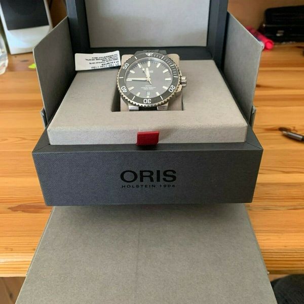 Oris Aquis Titanium Date Automatic Men's Watch | WatchCharts Marketplace