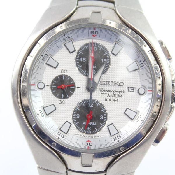 Mens Seiko Chronograph Titanium 100m Watch Ref 7T62-0EF0 Quartz Working | WatchCharts Marketplace