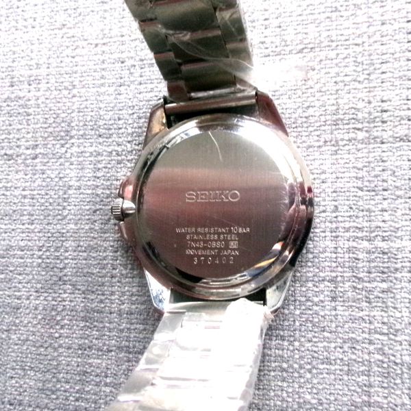 Seiko,Mans all stainless day/date.WR100m. 7N43-0BS0 Unmarked condition ...