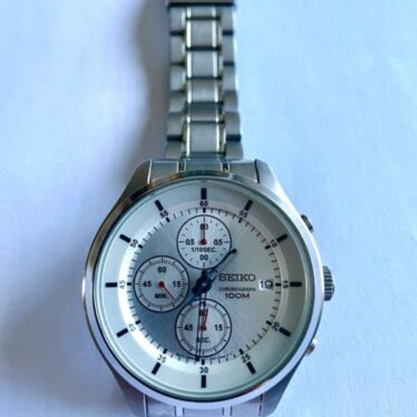 Mens Seiko white face 4T57-00 chronograph watch. | WatchCharts Marketplace