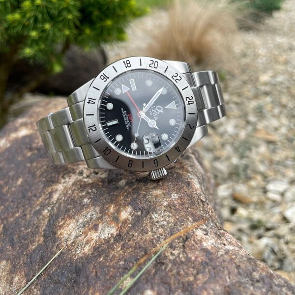 Alpha automatic GMT watch ceramic bezel | WatchCharts Marketplace