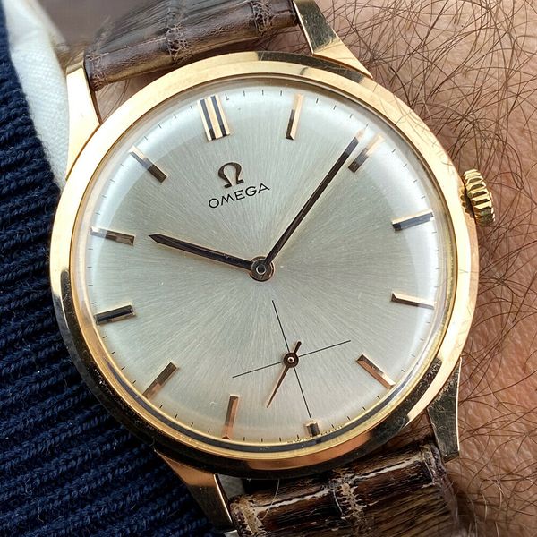 OMEGA 18k SOLID GOLD MEN'S DRESS WATCH from 1964 | WatchCharts