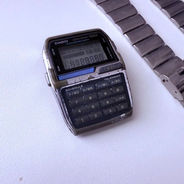 Casio Data Bank 150 DBC-150 Calculator Watch Model 1477 | WatchCharts ...