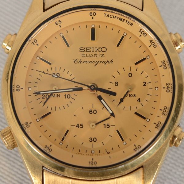 Seiko 7A28-7029 Chronograph Quartz Men Watch Gold Tone James Bond Works | WatchCharts Marketplace