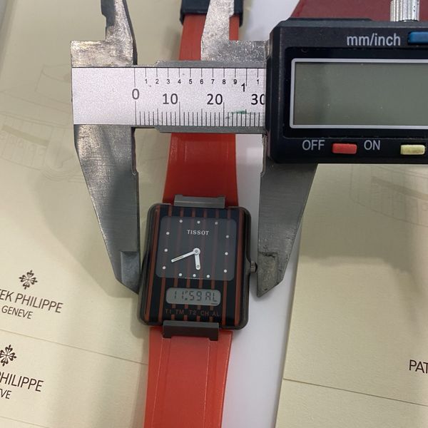 Tissot Dual Time - Rolex Holder | WatchCharts Marketplace