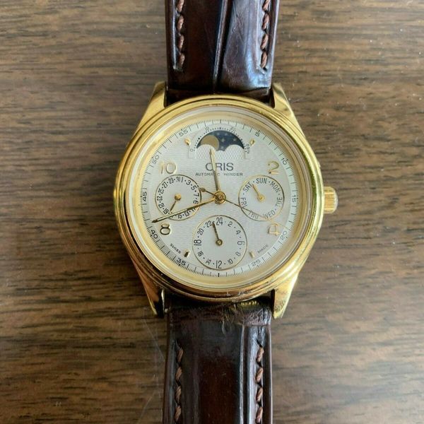 Vintage Swiss Oris auto date day moonphase GMT gold plated dressing watch | WatchCharts Marketplace