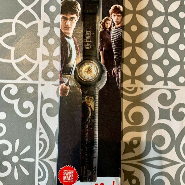 RARE SWATCH FLIK FLAK WATCH HARRY POTTER | WatchCharts Marketplace